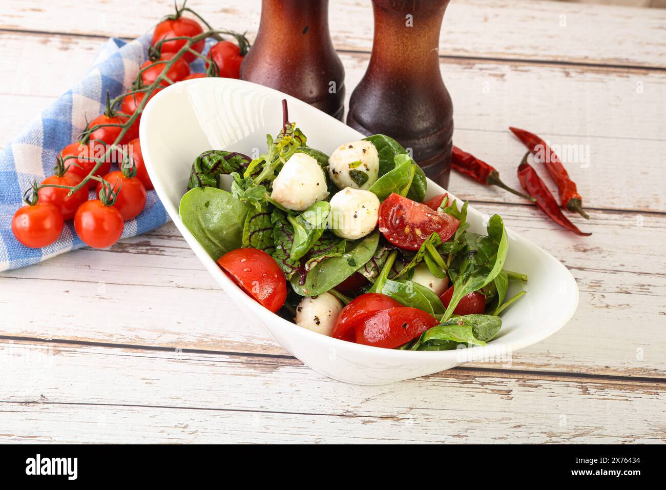 Mix salad with mini mozzarella and tomato Stock Photo - Alamy