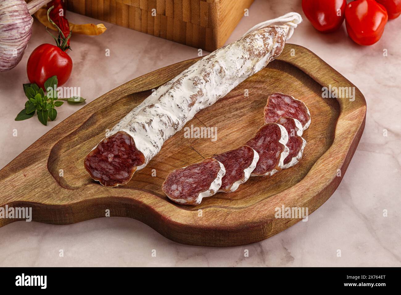 Spanish dry pork salami sausage Fuet Stock Photo - Alamy