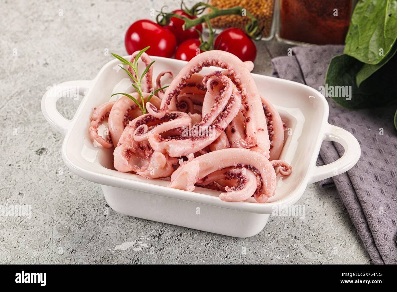 Marinated squid tentacles in the bowl for snack or salad Stock Photo ...
