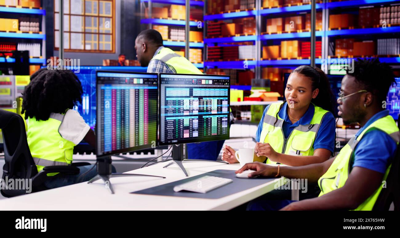 Warehouse Inventory Management On Computer. Staff In Office Stock Photo ...