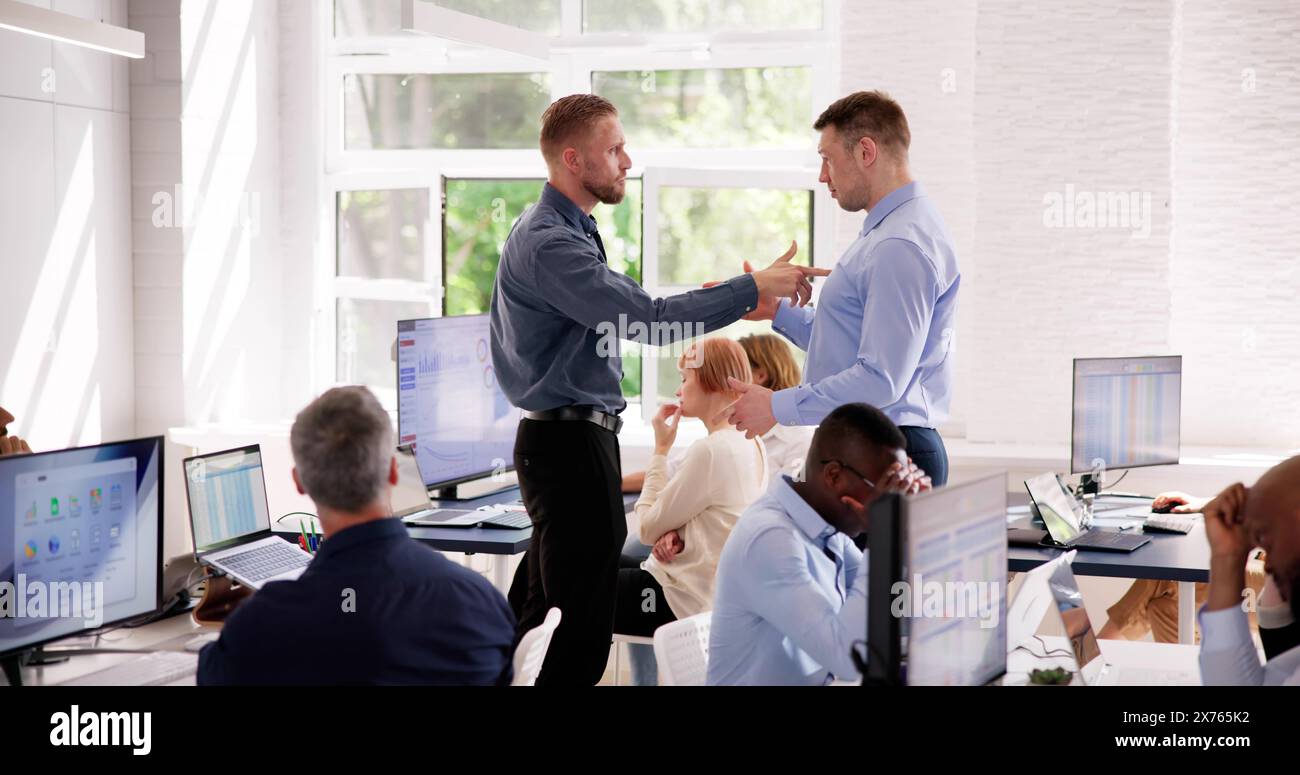 Angry Dominant Colleague Bullying Person At Workplace Stock Photo - Alamy