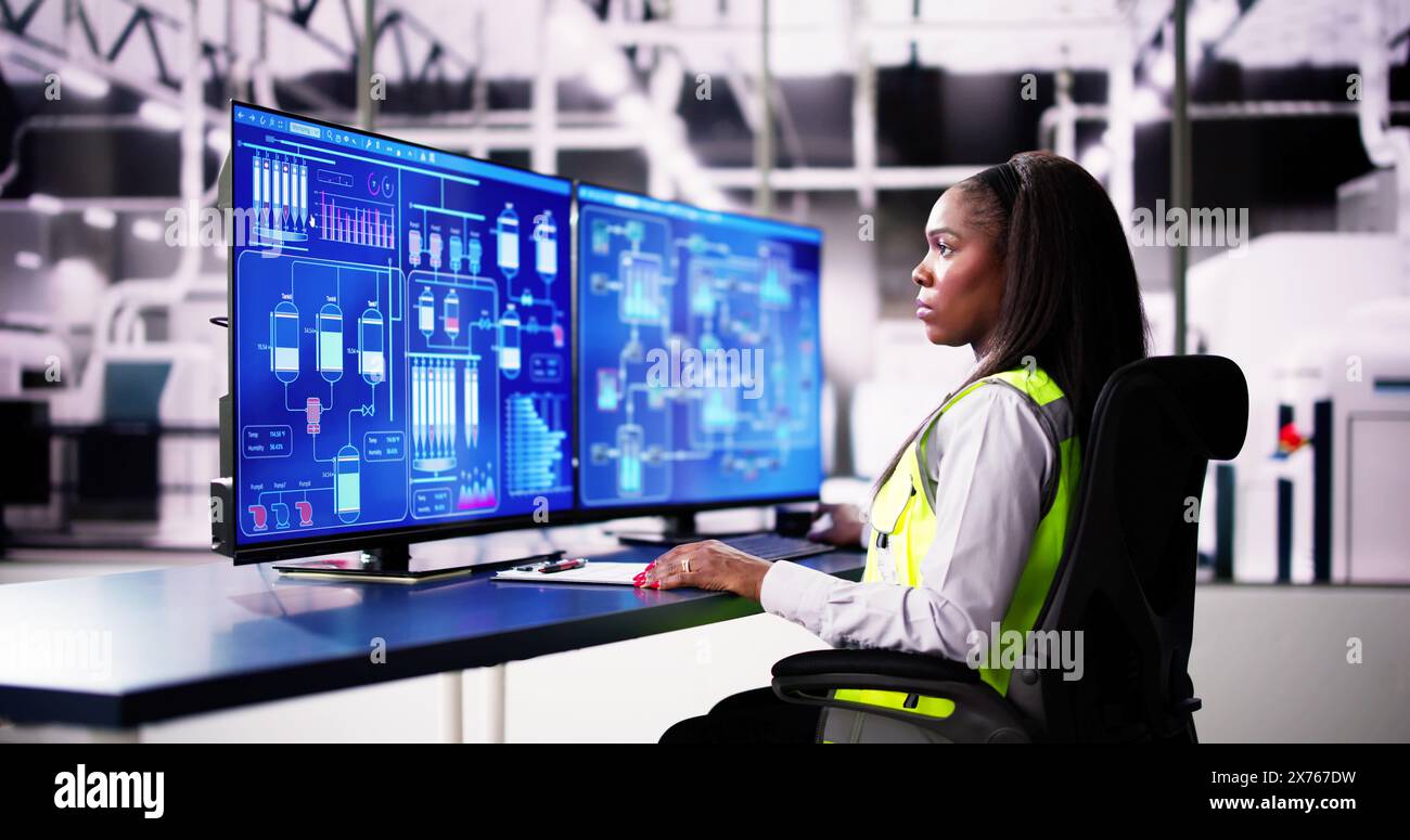 Engineer Operator Using Scada System At Industrial Plant Stock Photo - Alamy