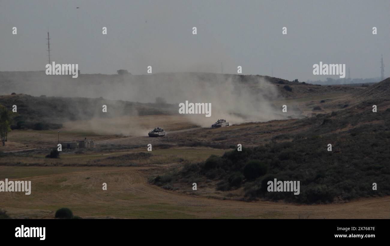 Israeli tanks roll near the border with Gaza strip on May 17, 2024 in ...
