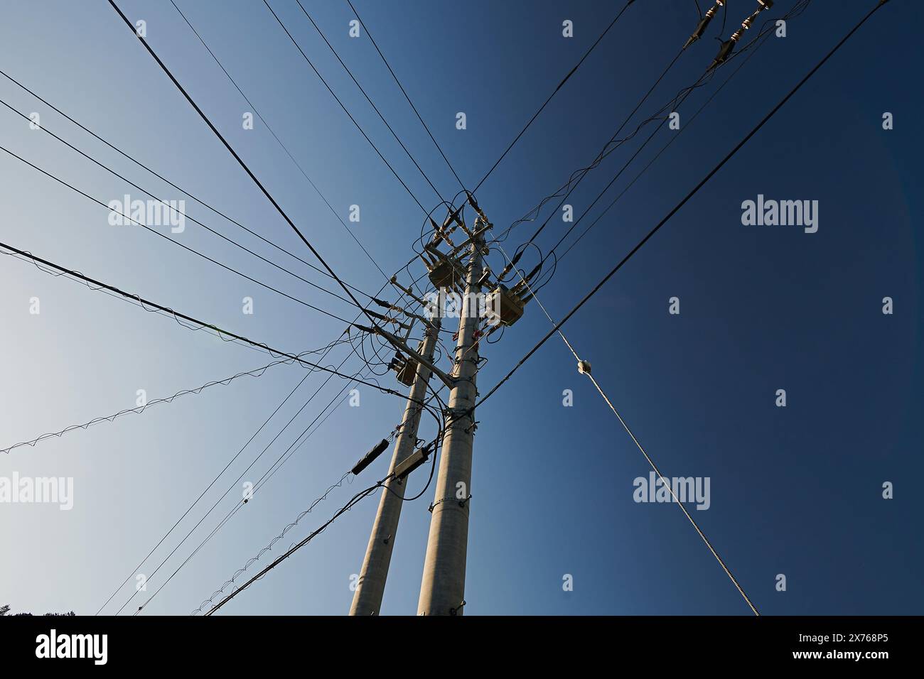 Utility cables on a pole in Japan are everywhere Stock Photo - Alamy