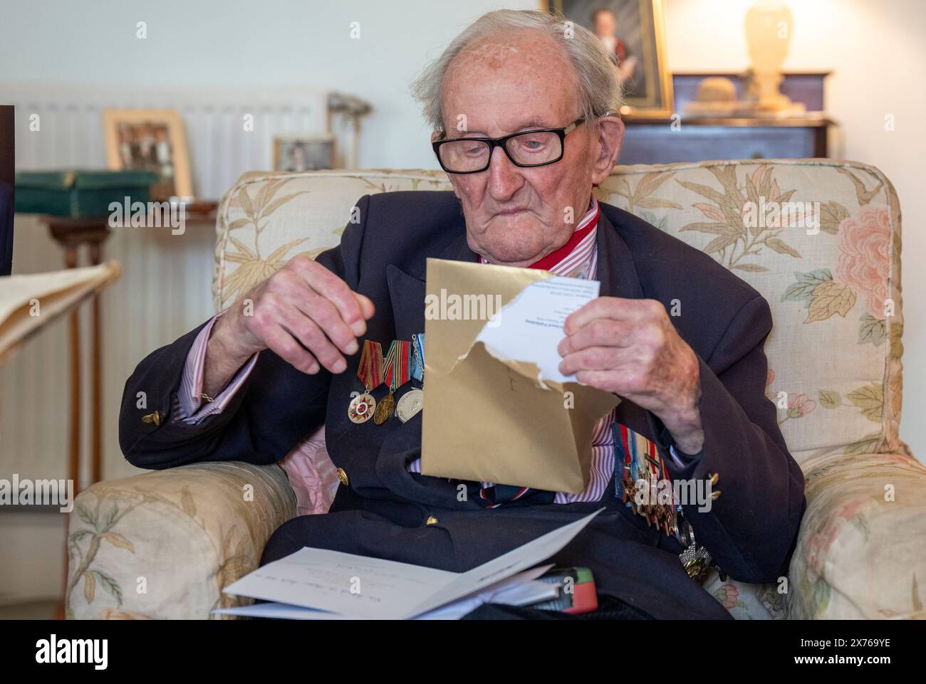 Vice Admiral Sir Thomas Baird, from Symington in Ayrshire, opens cards ...