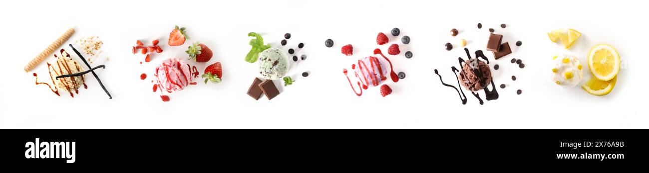 Assortment of ice cream balls decorated with fruits and syrups isolated ...