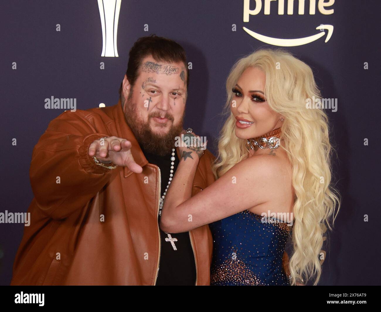 Frisco, USA. 17th May, 2024. Jelly Roll and Bunnie XO attends the 59th ...