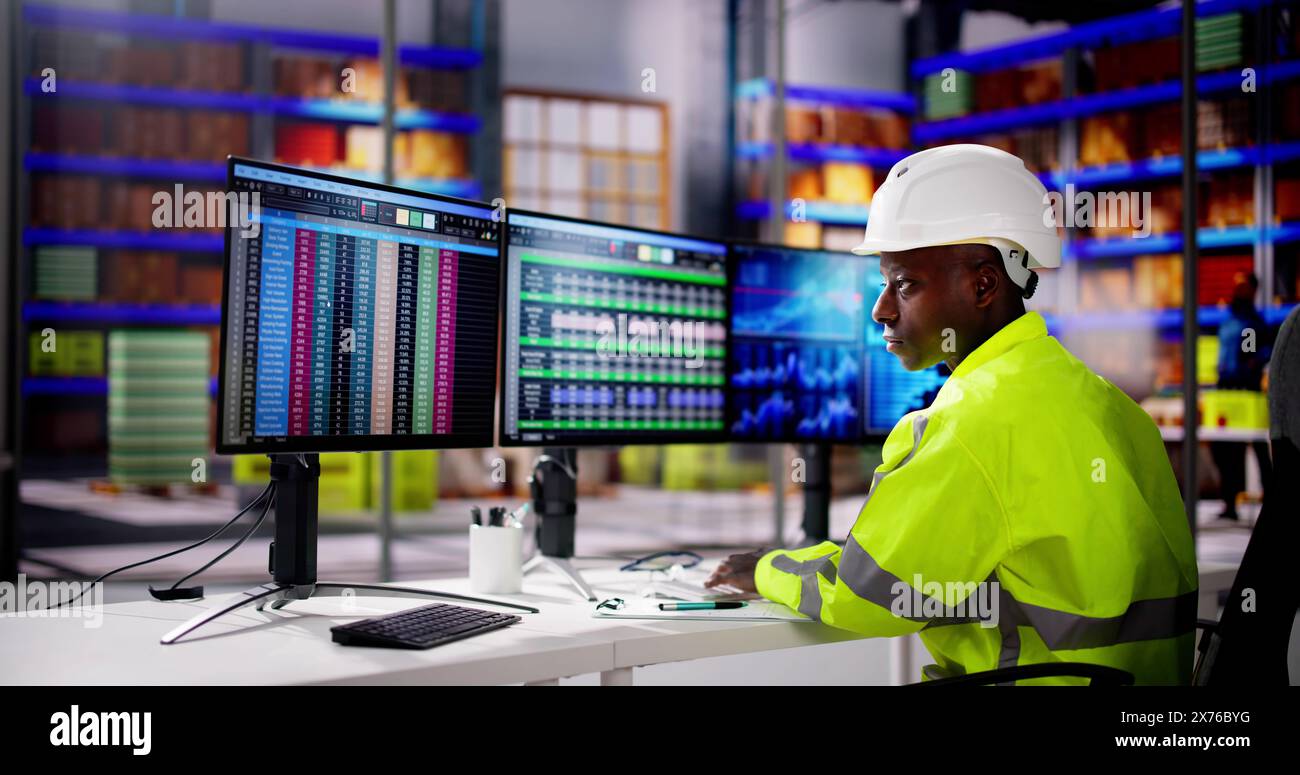 Warehouse Inventory Management On Computer. Staff In Office Stock Photo ...