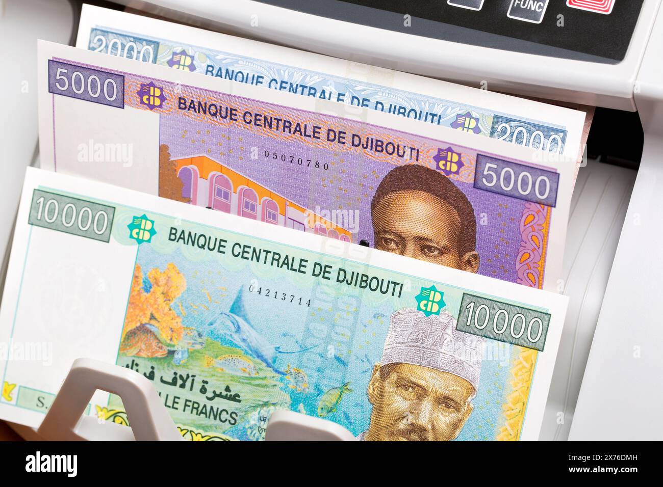 Djiboutian money - franc in a counting machine Stock Photo - Alamy
