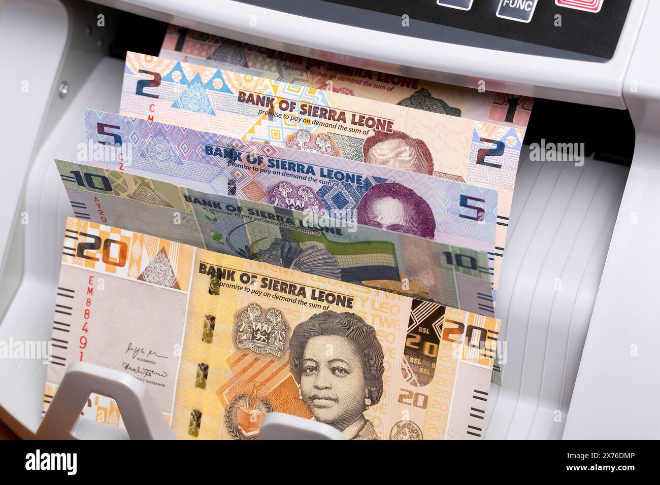Sierra Leonean money - leone in a counting machine Stock Photo - Alamy