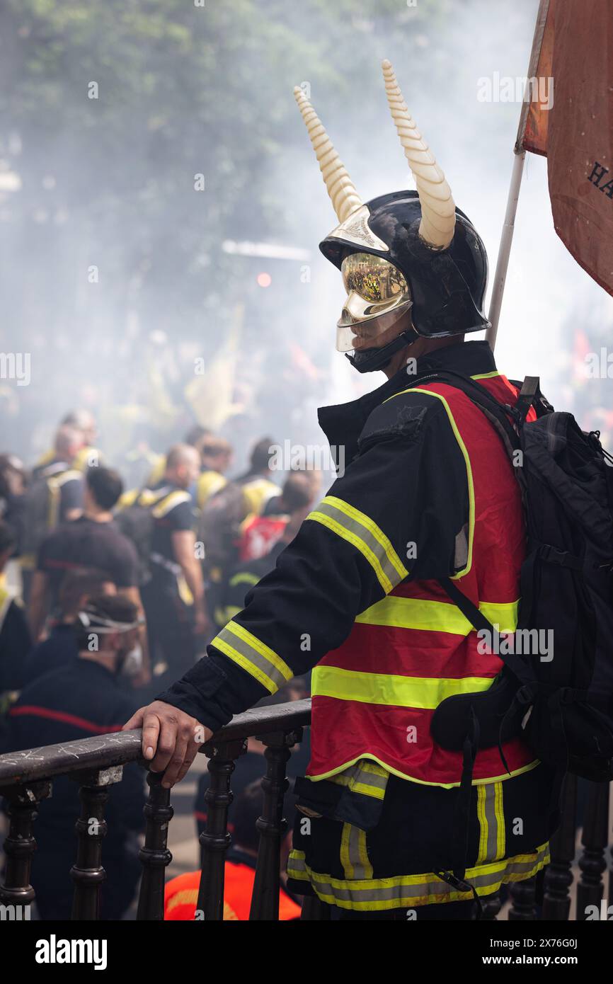 Paris, France. 16th May, 2024. A firefighter seen with a helmet with ...
