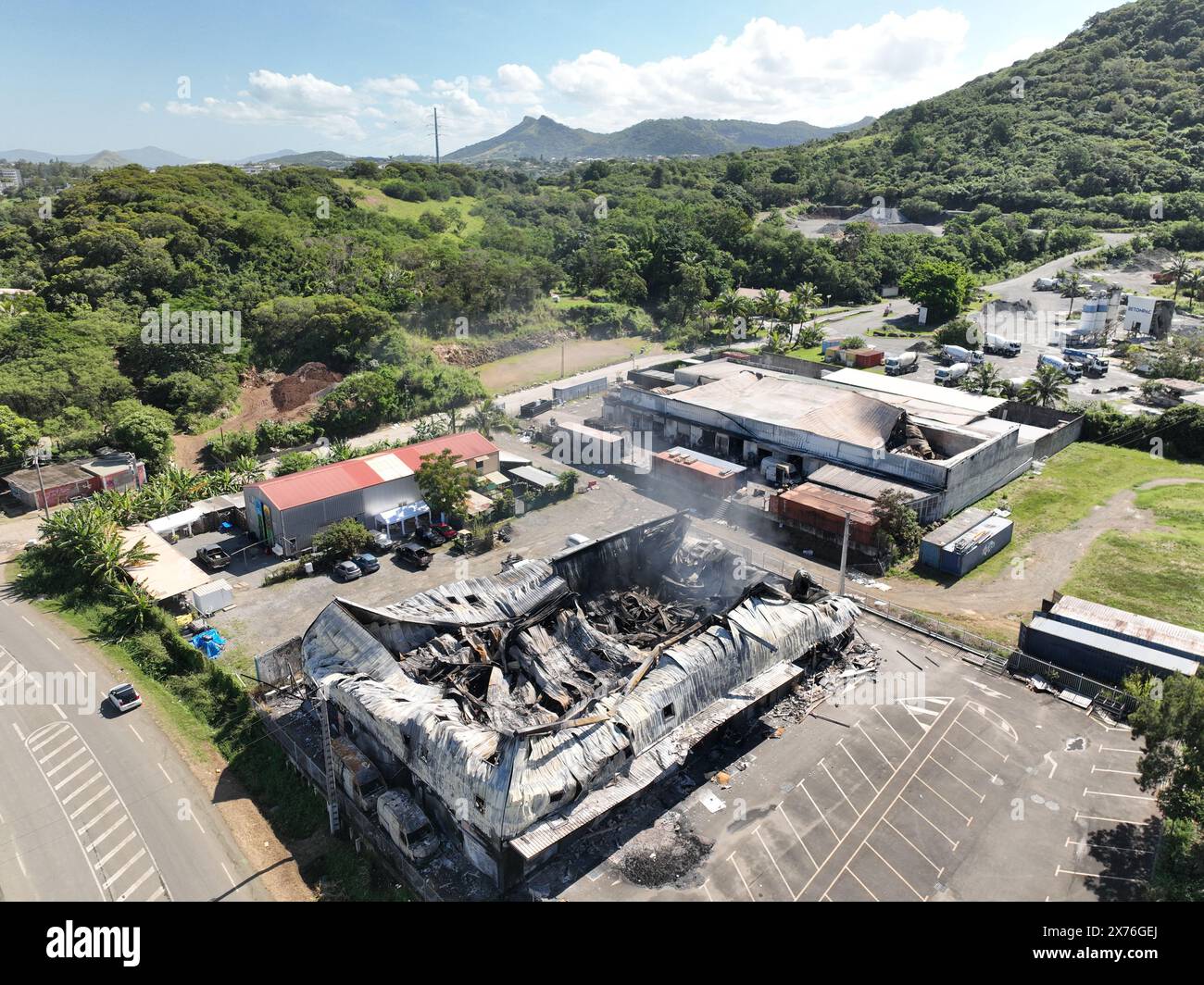 Remains of the docks destroyed during the fires started by rioters in ...