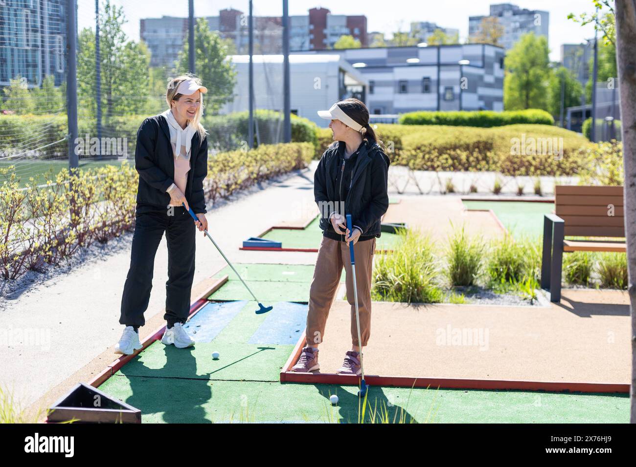 cute little girl on a miniature golf course Stock Photo - Alamy