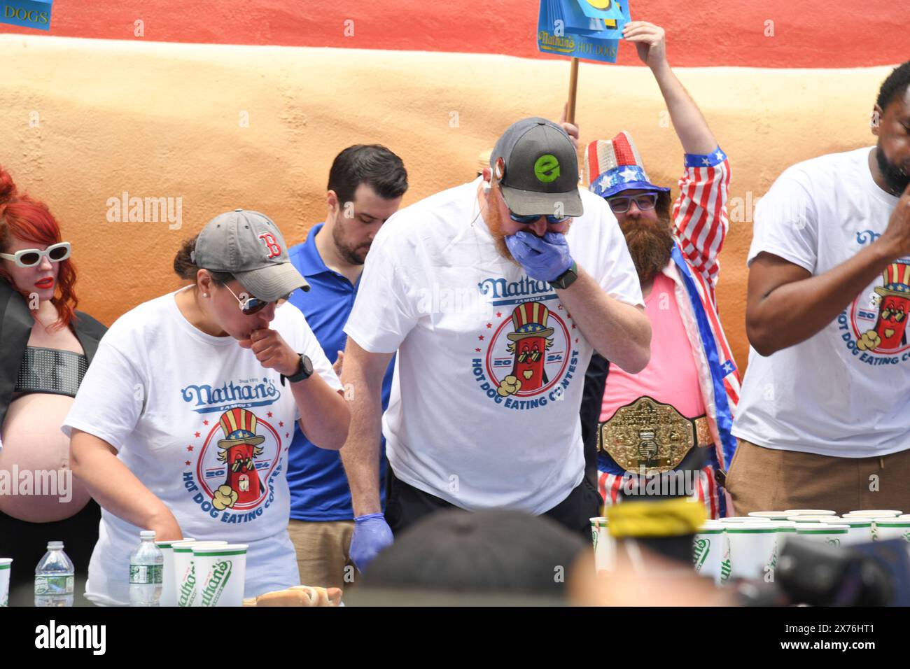 New York, USA. 17th May, 2024. Competitive eaters participate in the ...