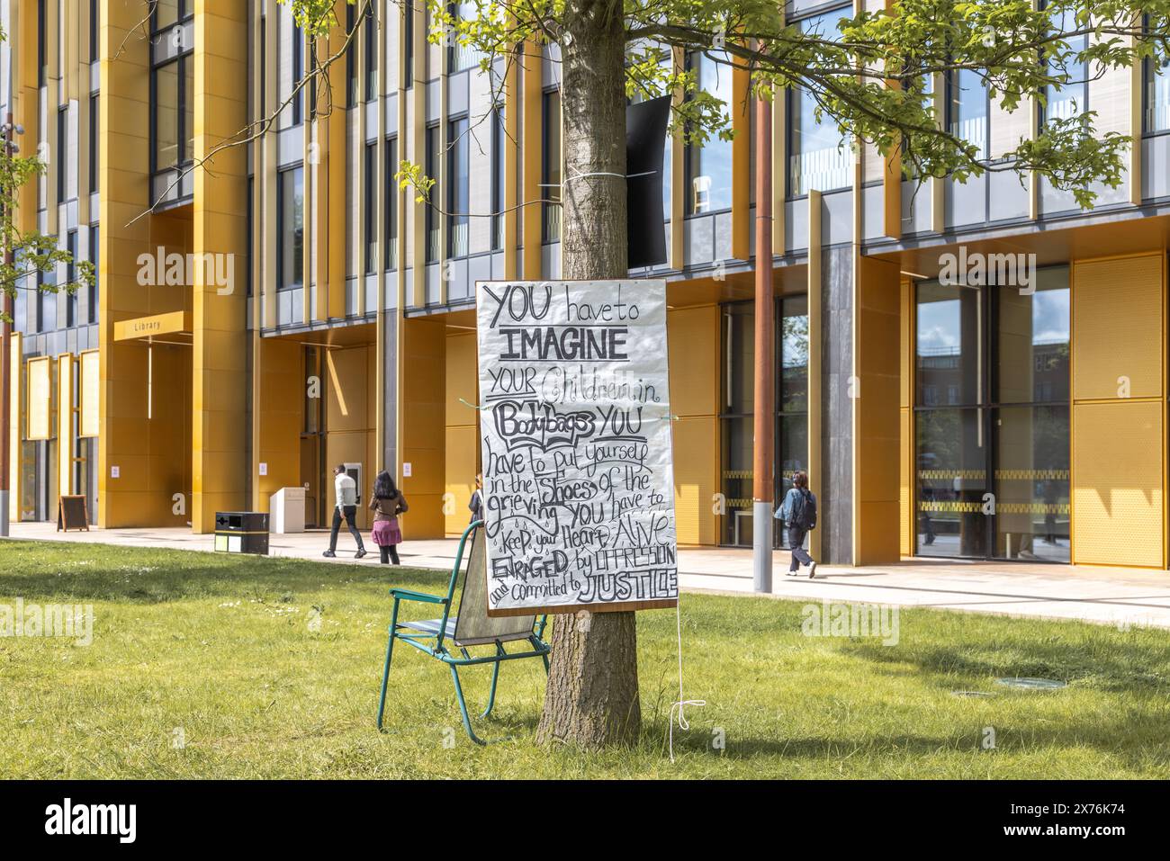 A banner attached to a tree by student protestors at the Pro ...