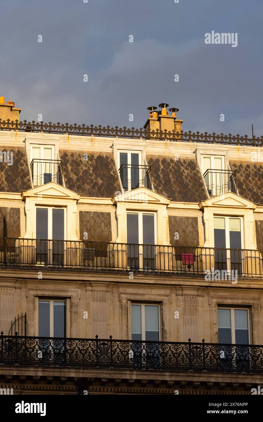 classic parisian rooftop with dormer windows and chimneys Stock Photo ...
