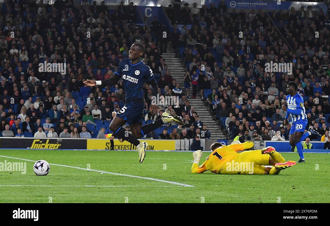 Nicolas Jackson of Chelsea is fouled by Bart Verbruggen of Brighton and ...