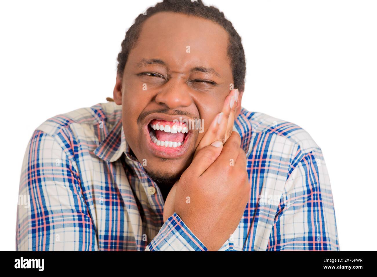 Closeup portrait handsome young man touching face having really bad ...