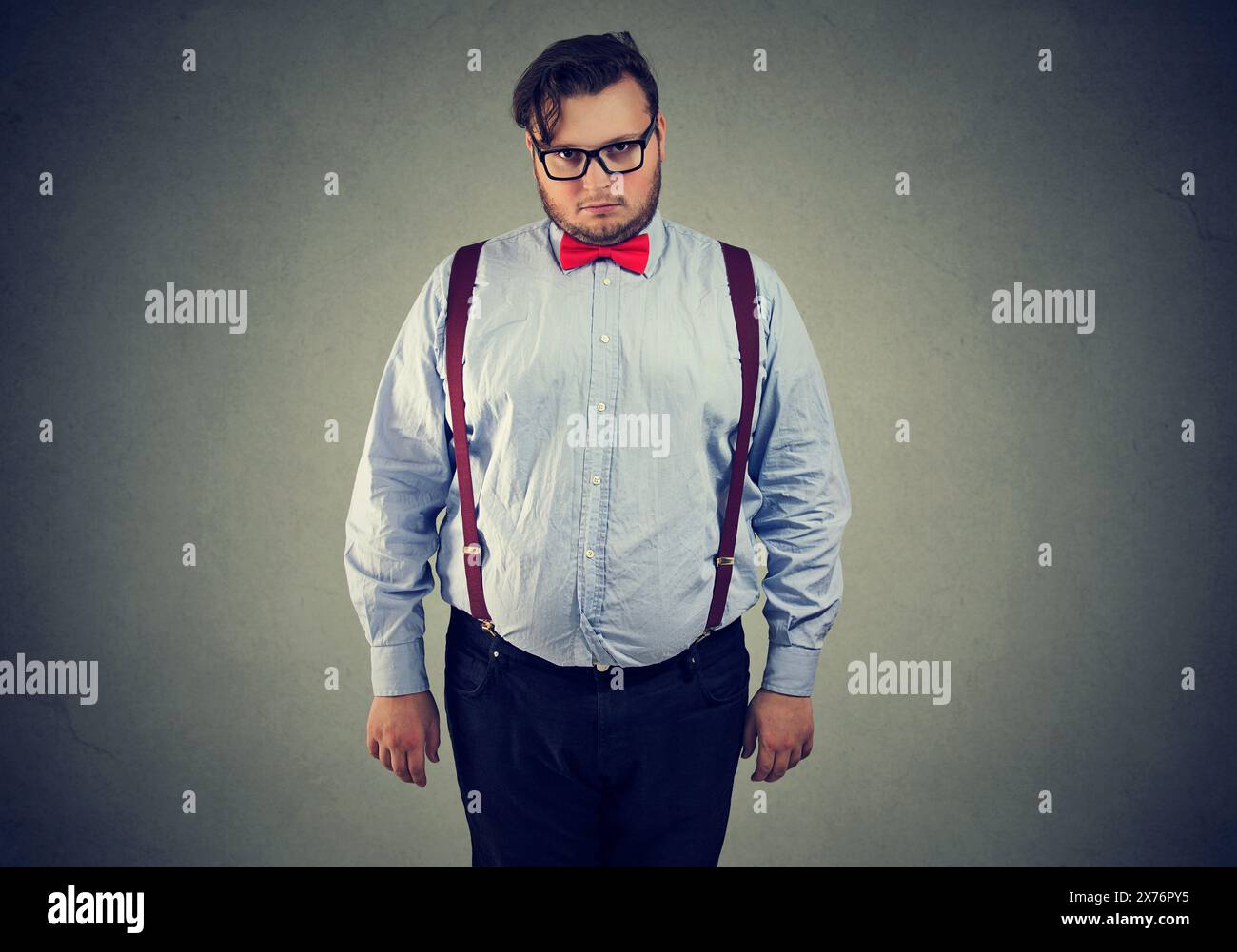 Portrait of a serious eccentric young man Stock Photo - Alamy