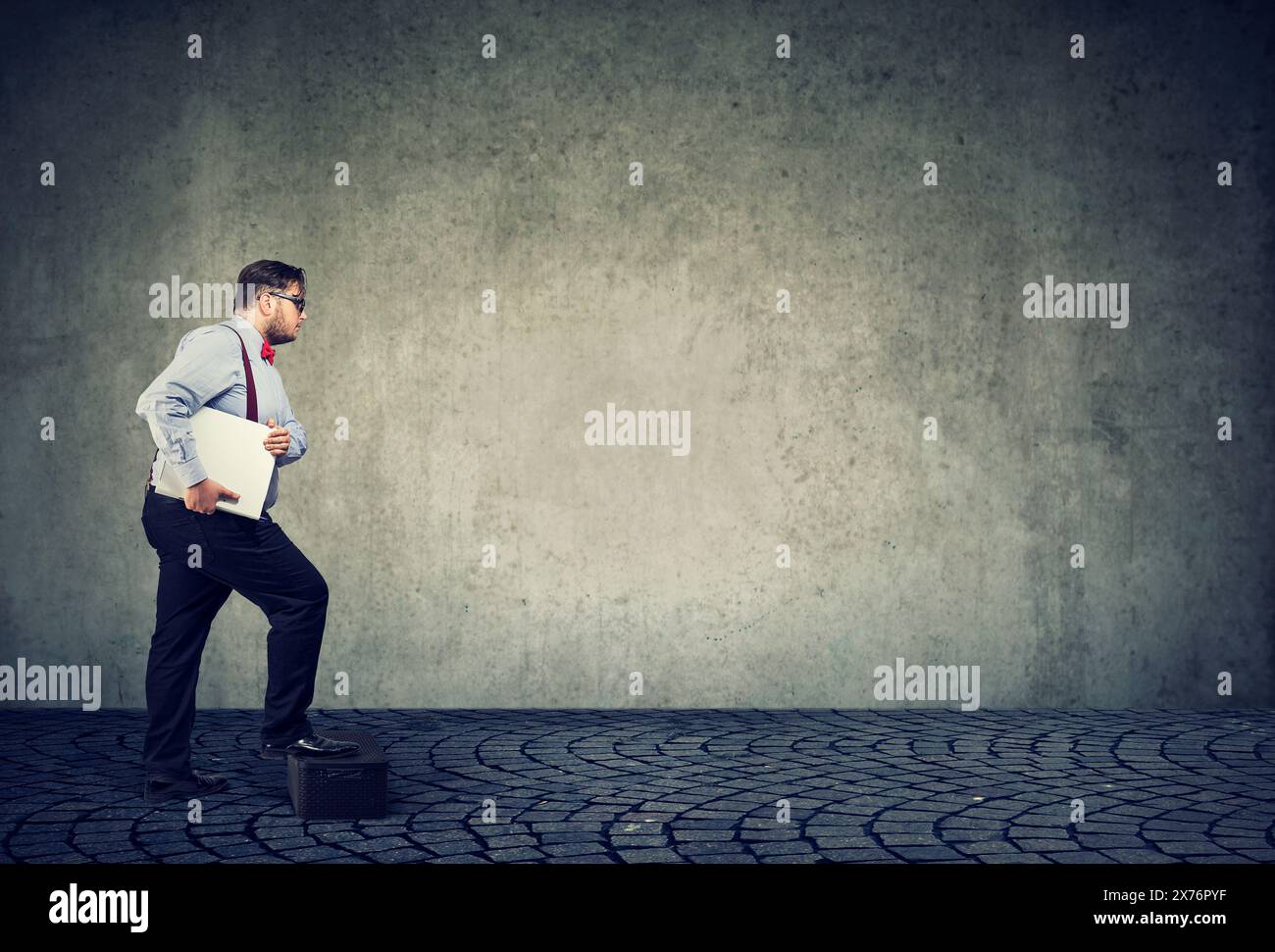 Businessman making his first step towards career goals Stock Photo - Alamy