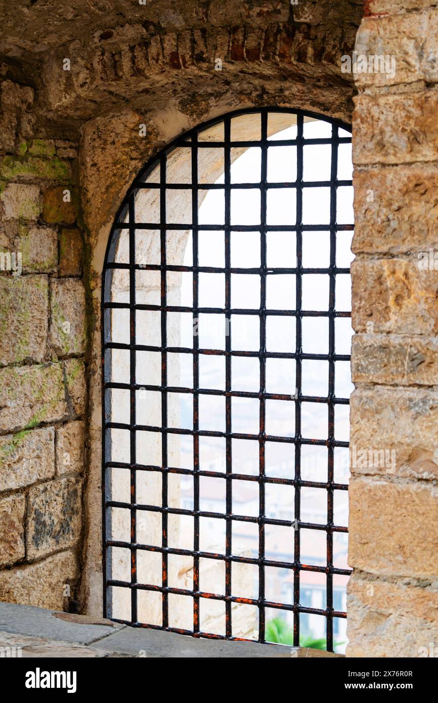 arched stone window with iron bars Stock Photo - Alamy