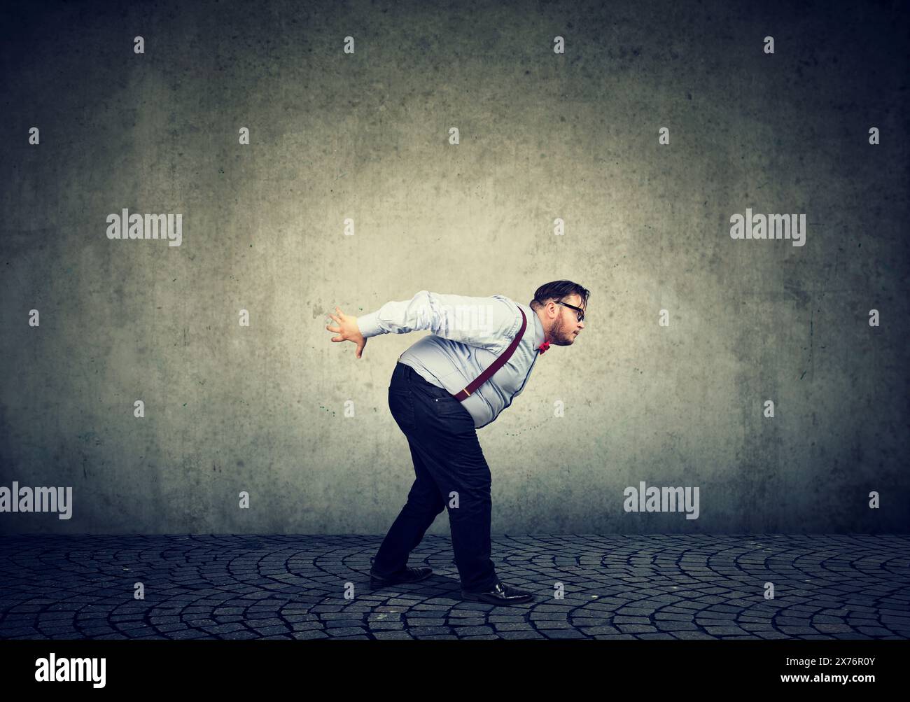 Man bending over hi-res stock photography and images - Alamy