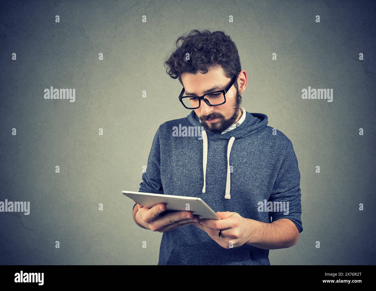 Man using tablet play hi-res stock photography and images - Alamy