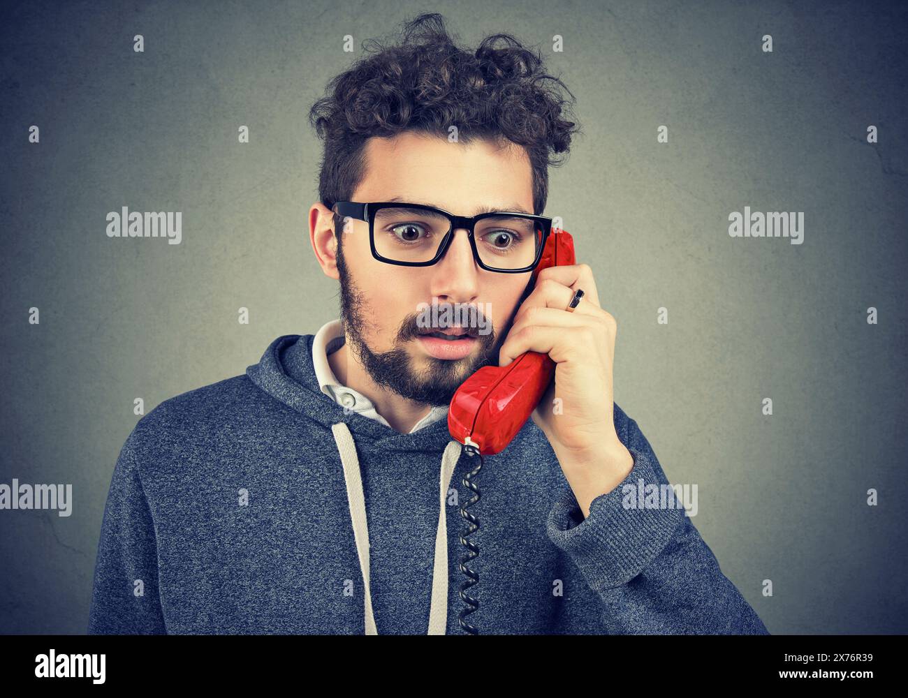 Portrait of an anxious man receiving bad news on a phone Stock Photo ...