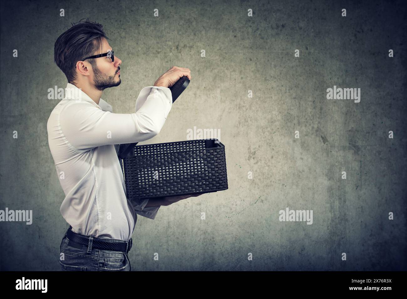 businessman opening storage box and sharing its contents Stock Photo ...