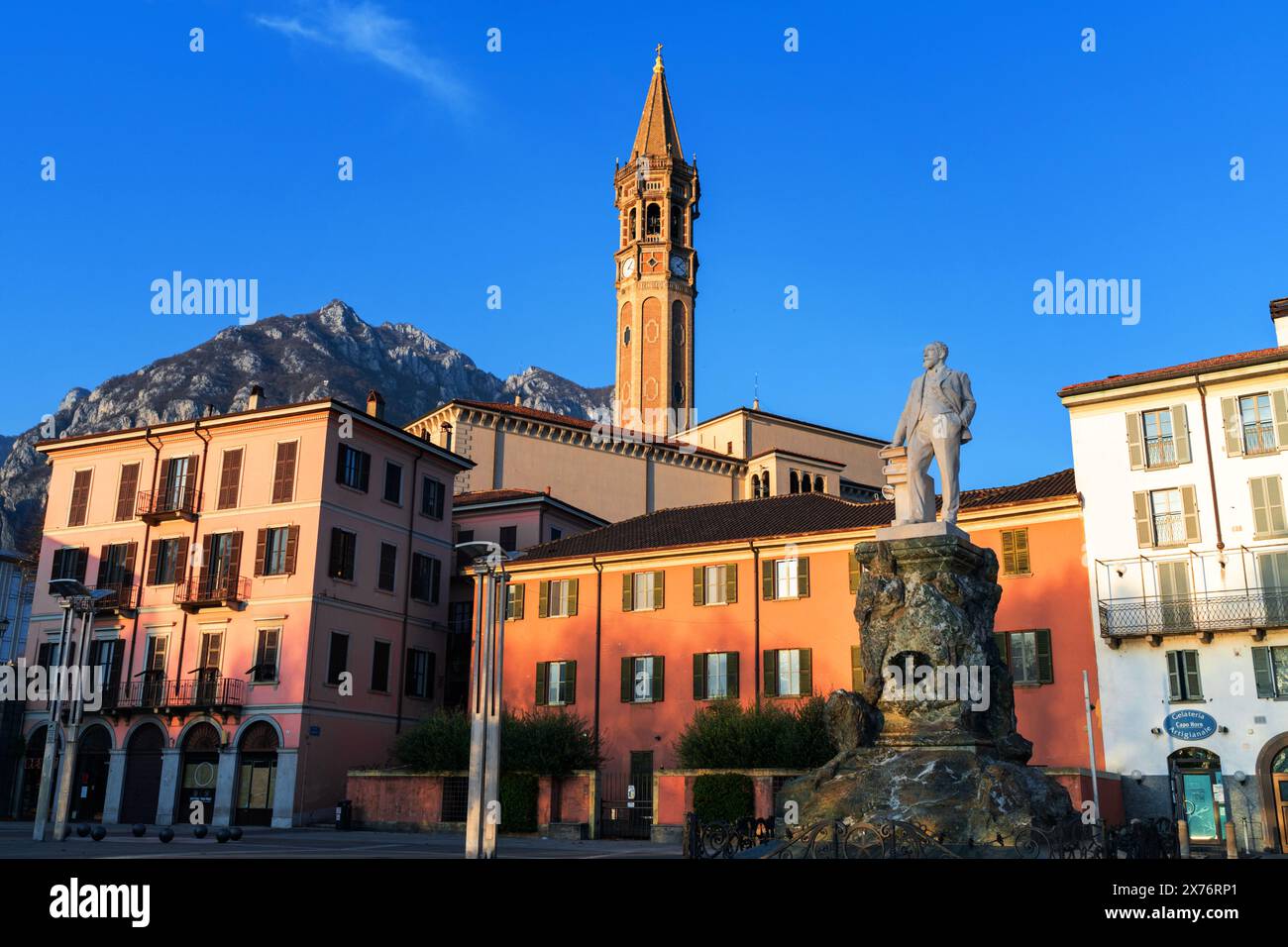 Town square with statue and clock tower Stock Photo - Alamy