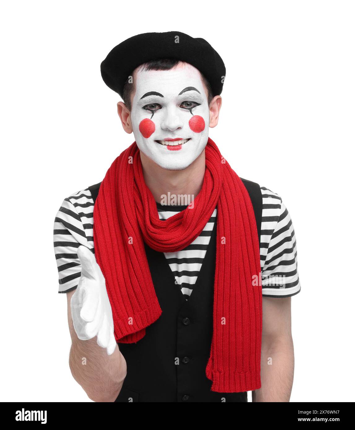 Funny mime artist greeting someone on white background Stock Photo - Alamy