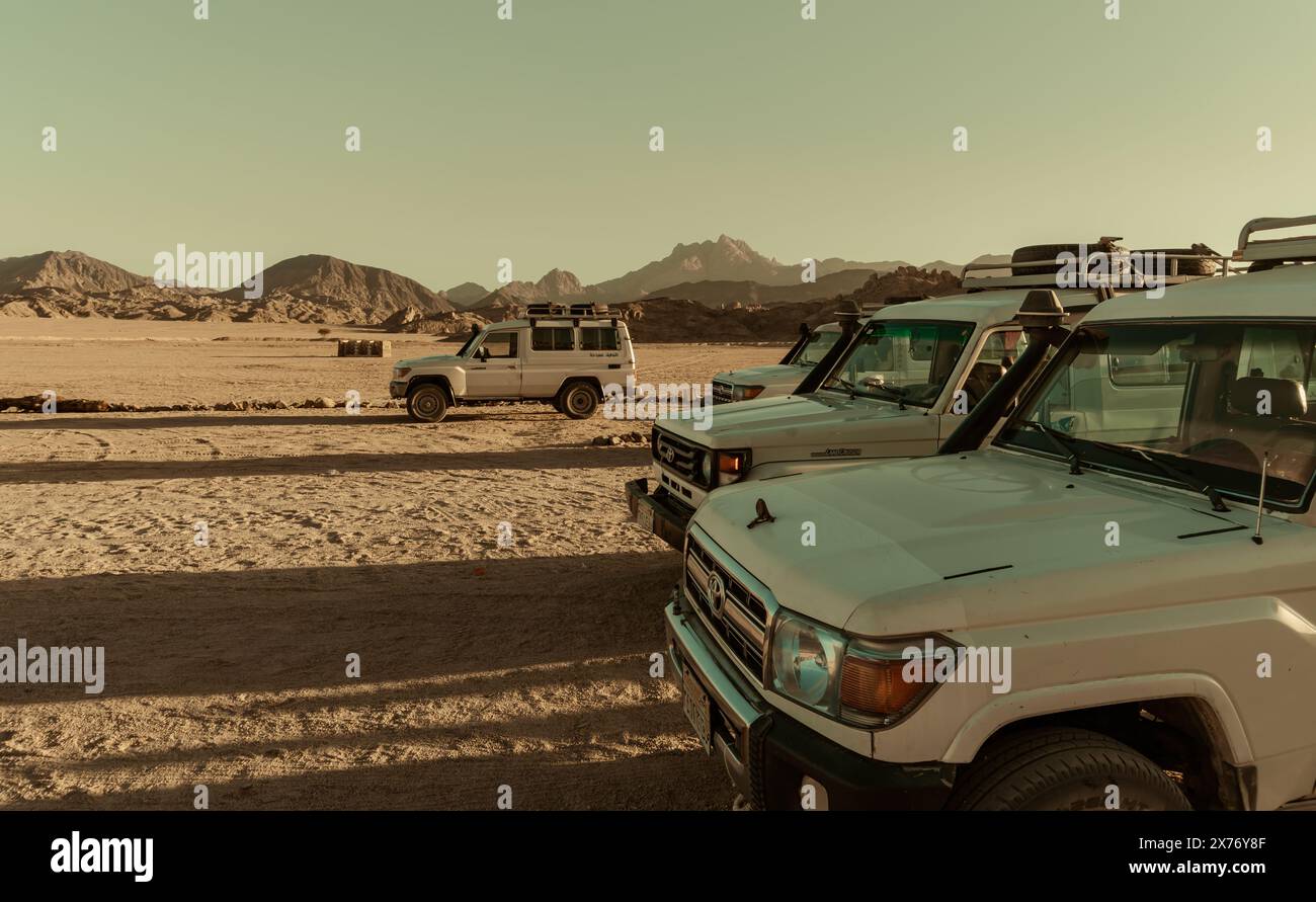 Tourists Safari Touring Jeeps In Desert Landscape Stock Photo - Alamy
