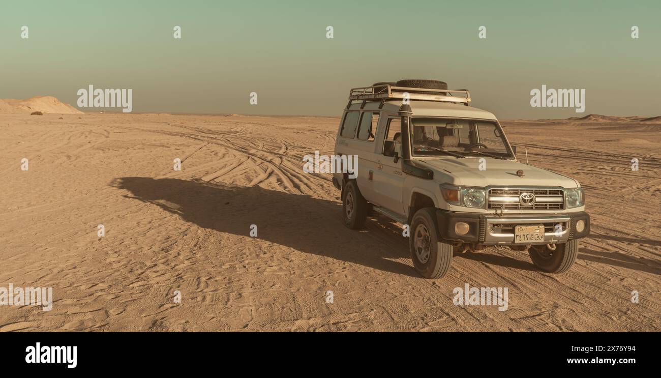Tourists Safari Touring Jeep In Desert Landscape Stock Photo - Alamy