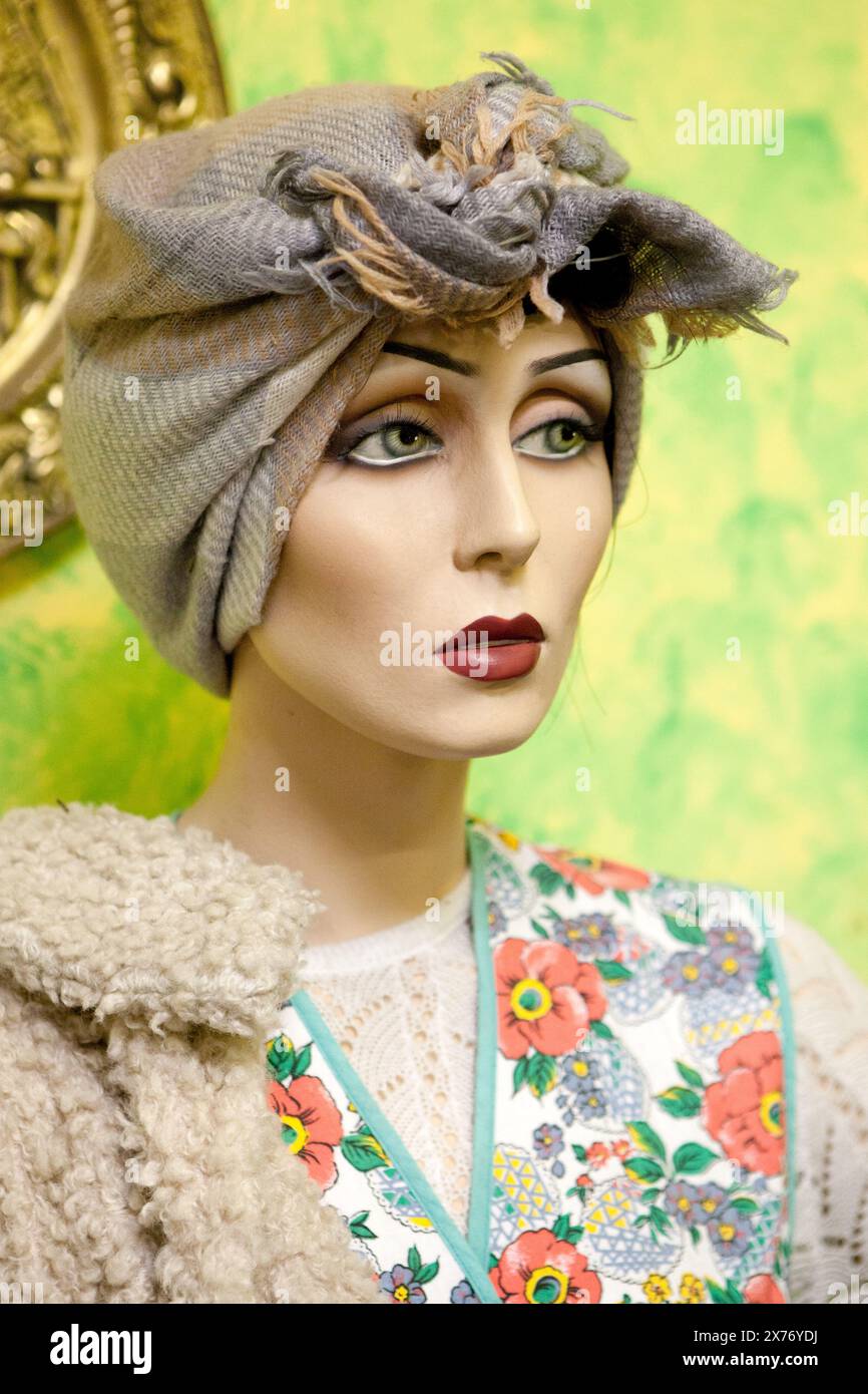 A classic female mannequin wearing a headscarf Stock Photo - Alamy