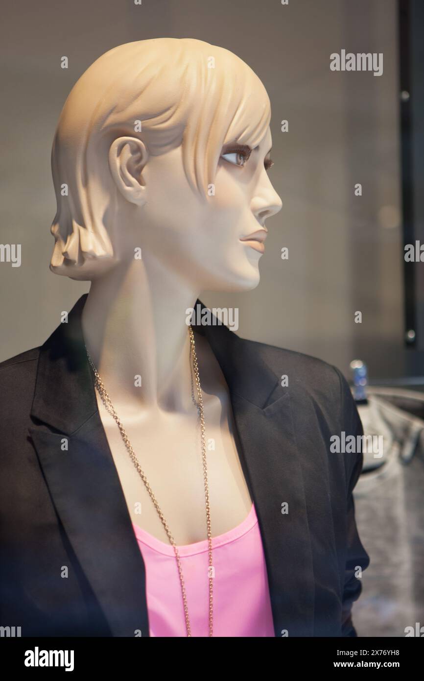 A profile portrait of a fashion mannequin in a clothing shop Stock ...