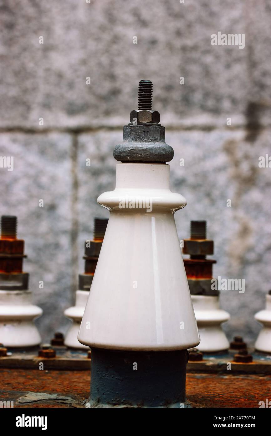 Old rusty bolts, steel nuts on white background. A large rusted bolt ...
