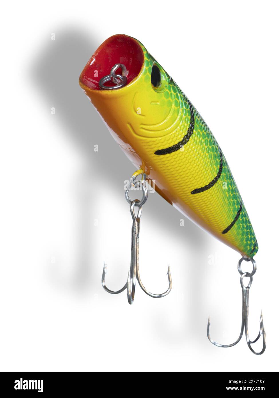 Light drop shadow behind an artificial fishing bait retrieved on the ...