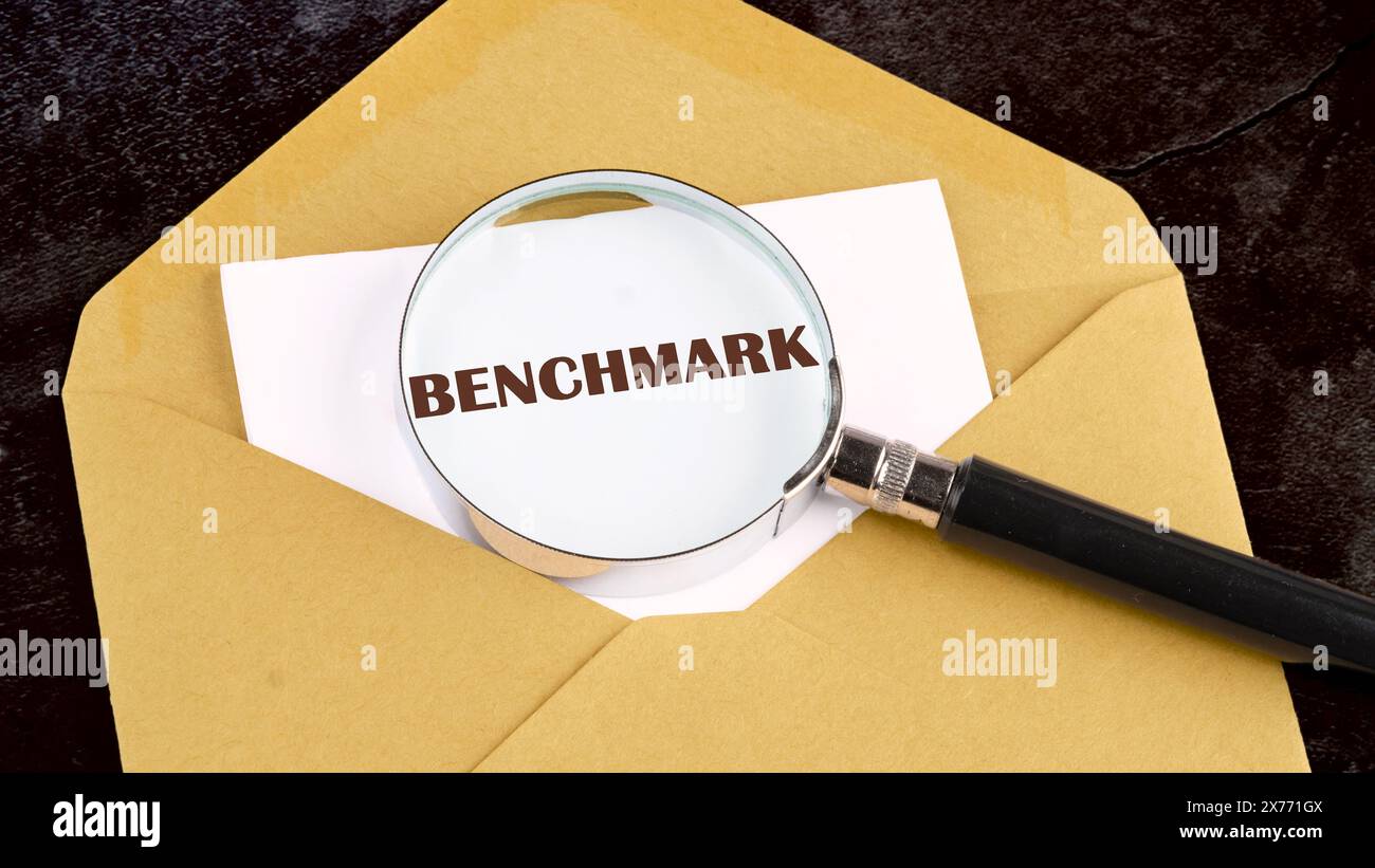 Business concept of benchmark. A word BENCHMARK written on a white ...