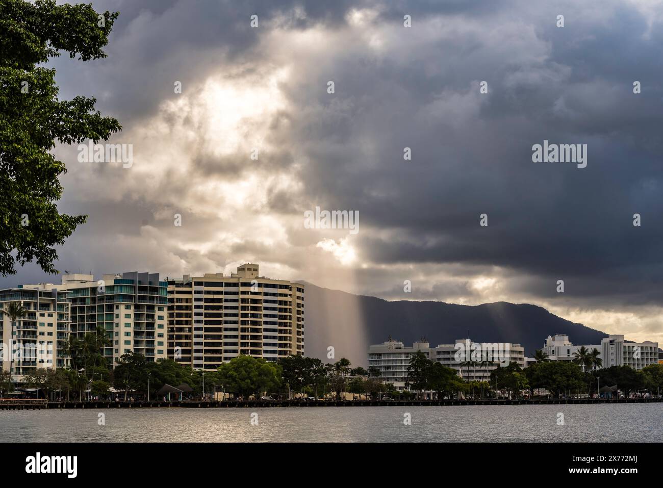 Sunshine streams through a gap in the clouds onto the Esplanade and ...