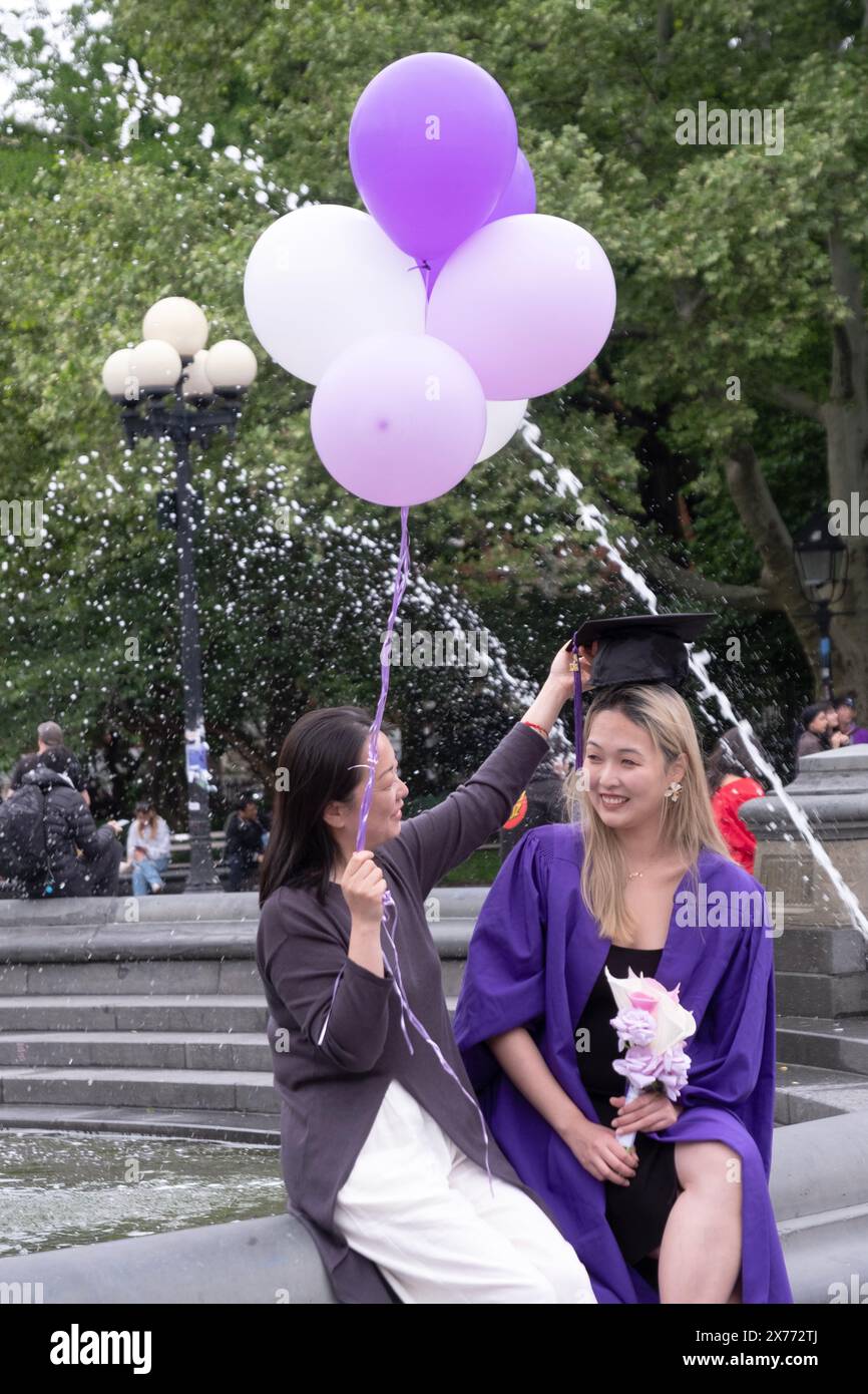 FAMILY PRIDE. After the 2024 NYU graduation ceremony a beautiful Asian ...