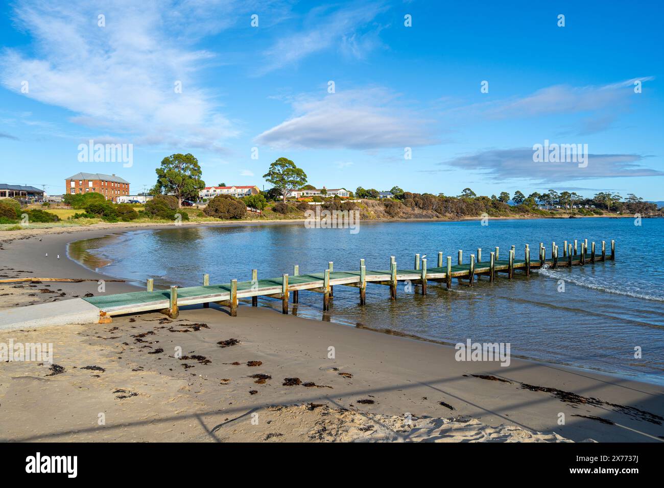 Long jetty at boat ramp, Jubilee Beach Swansea, Tasmania Stock Photo ...