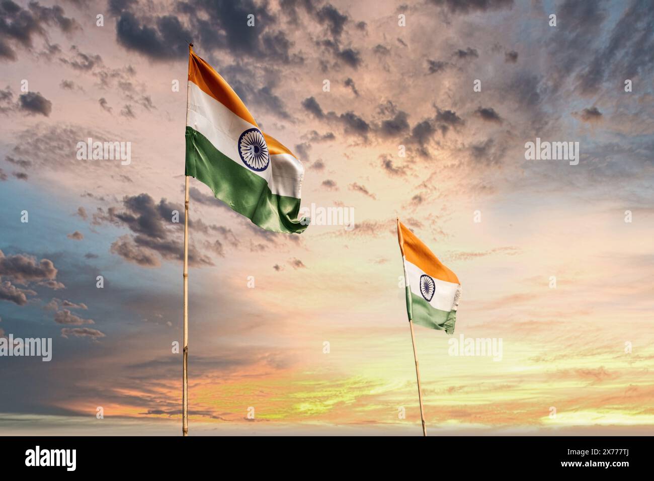 two Indian tri color with saffron green white and ashoka chakra waving ...