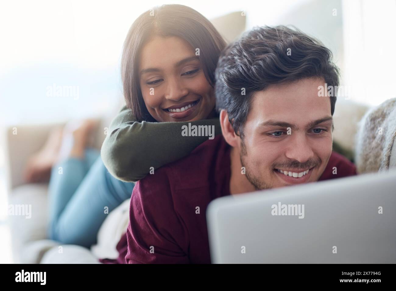 Couple, watch and laptop for movies, love and entertainment with ...