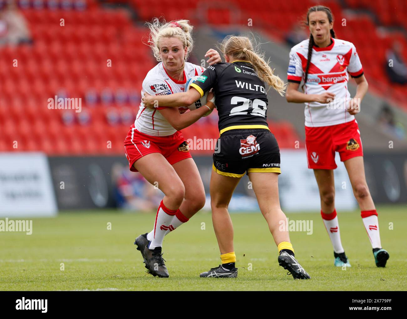 Saint Helens' Jodie Cunningham is tackled by York Valkyrie's Remi ...