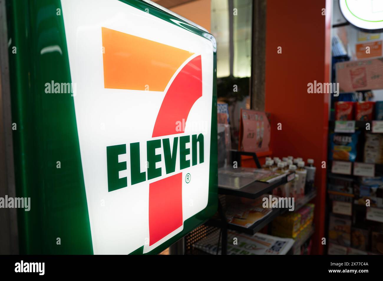 HONG KONG, CHINA - DECEMBER 06, 2023: close up shot of 7-Eleven sign as ...