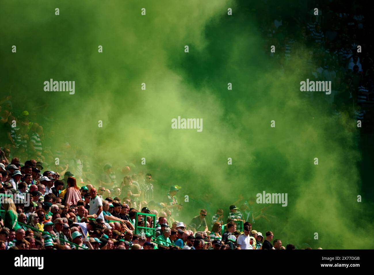 Celtic fans set off green smoke flares in the stands during the cinch ...