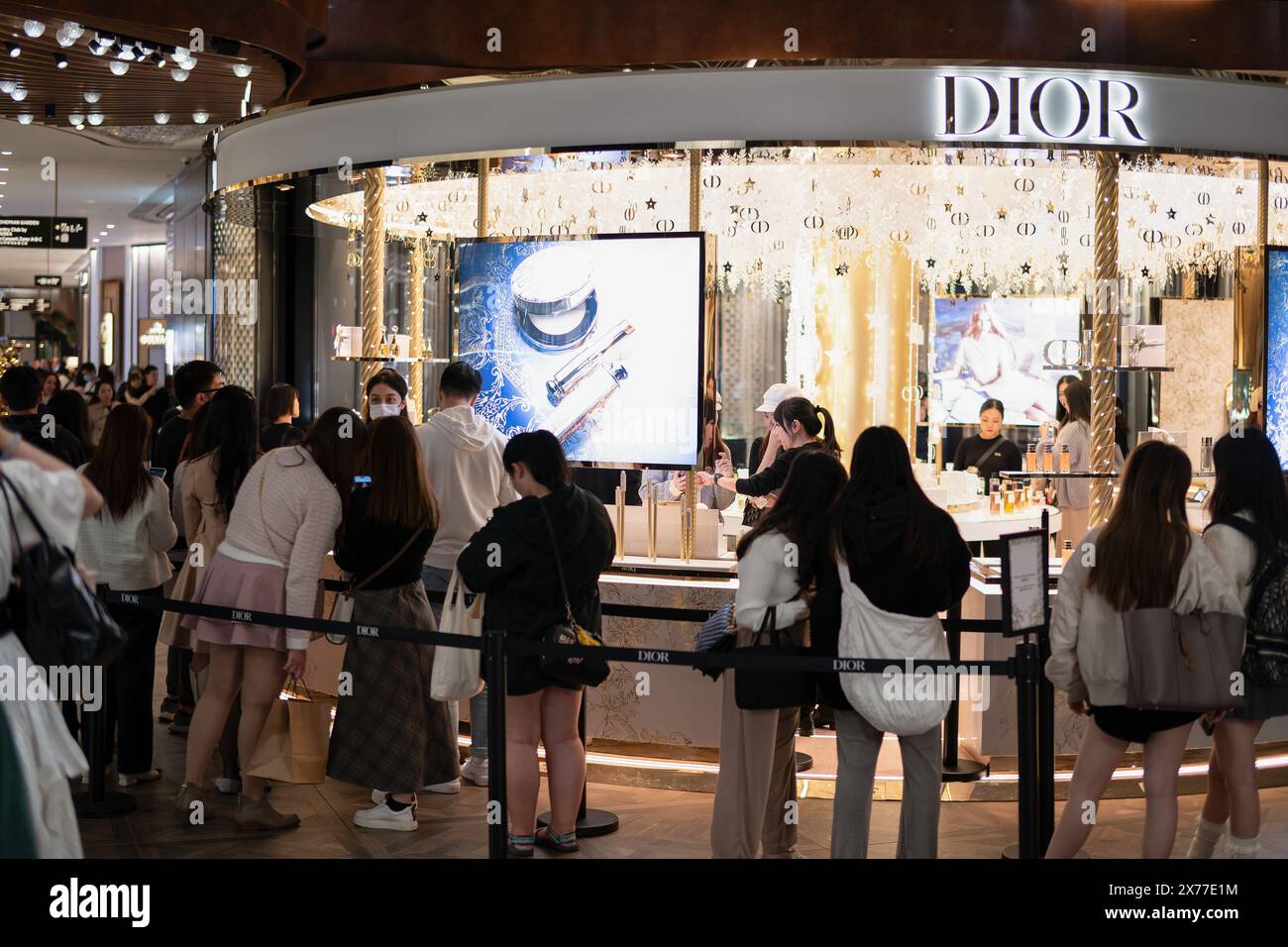 HONG KONG, CHINA - DECEMBER 07, 2023: people in line at Pop-up Shop Dior inside K11 Musea, Hong ...