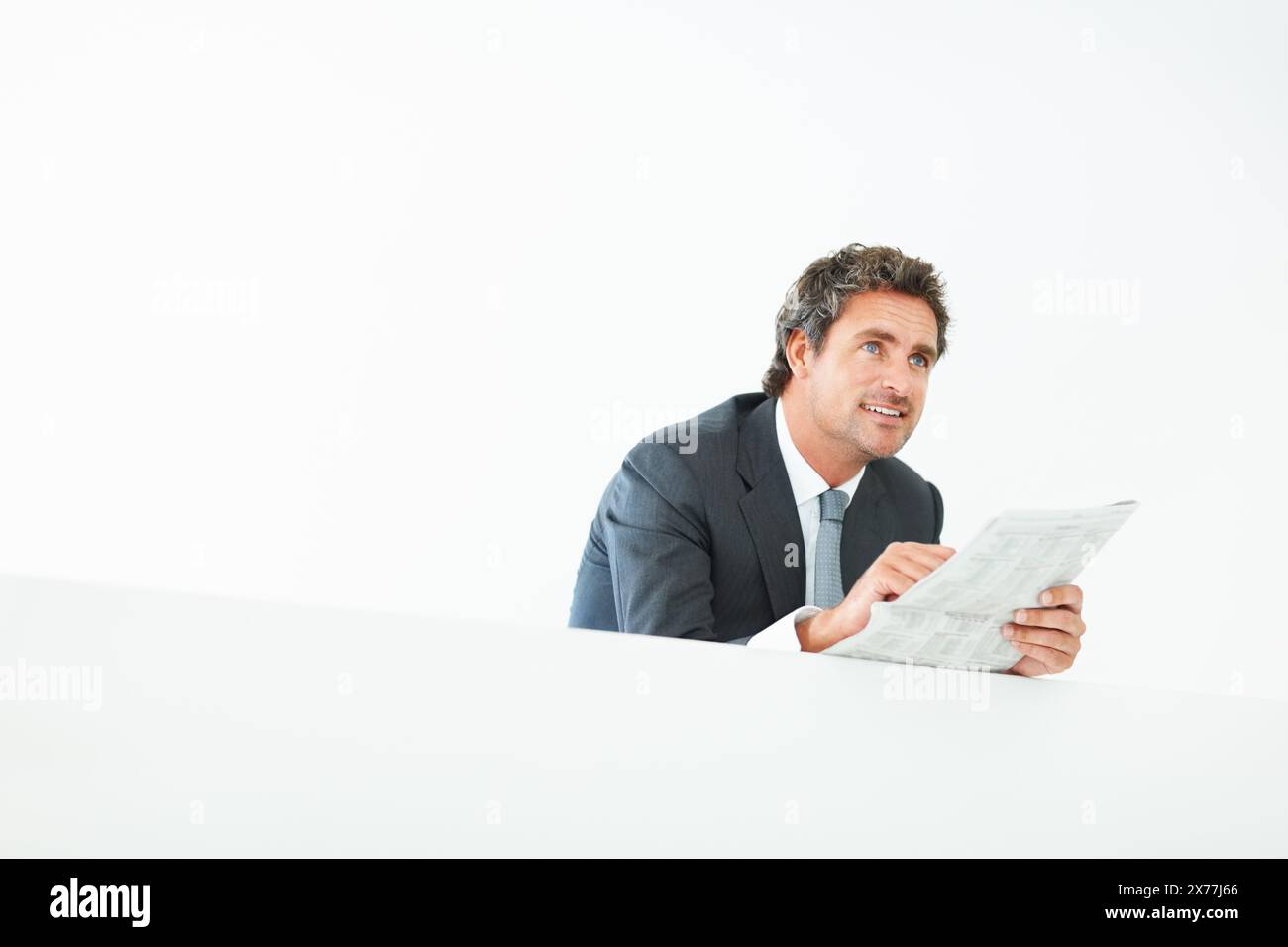 Businessman smiling reading information hi-res stock photography and ...