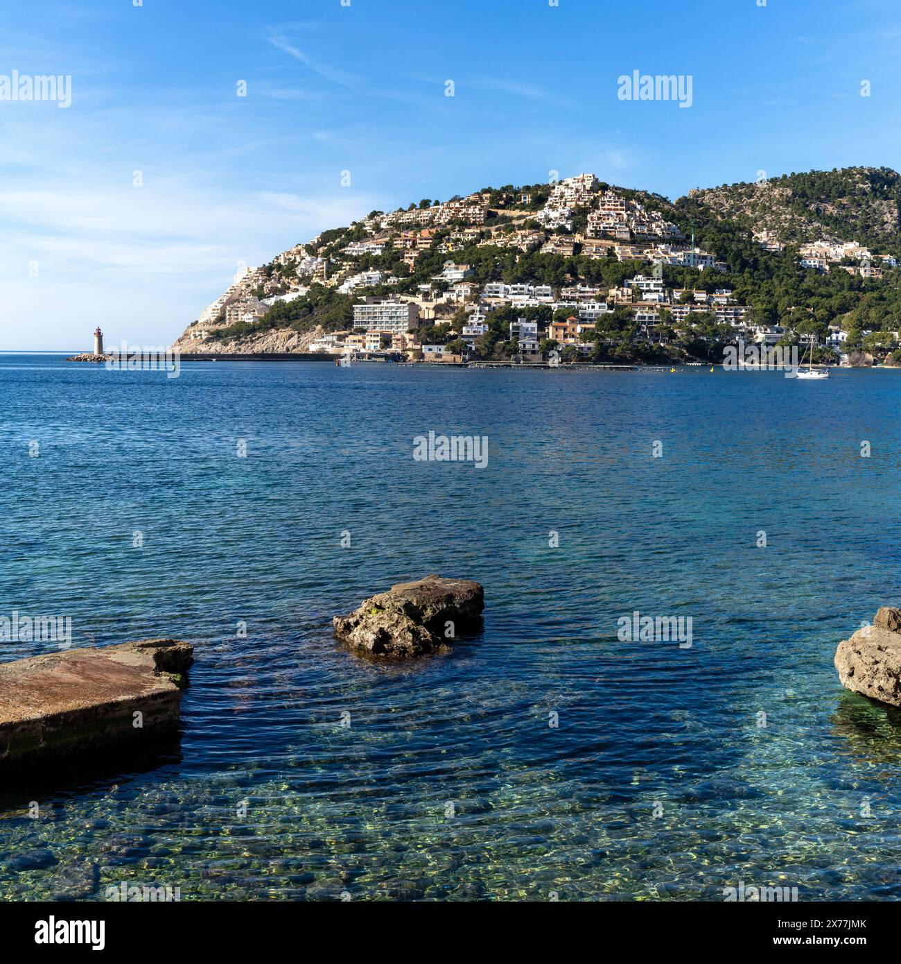 A view of the idyllic natural port and harbour town of Andratx in ...