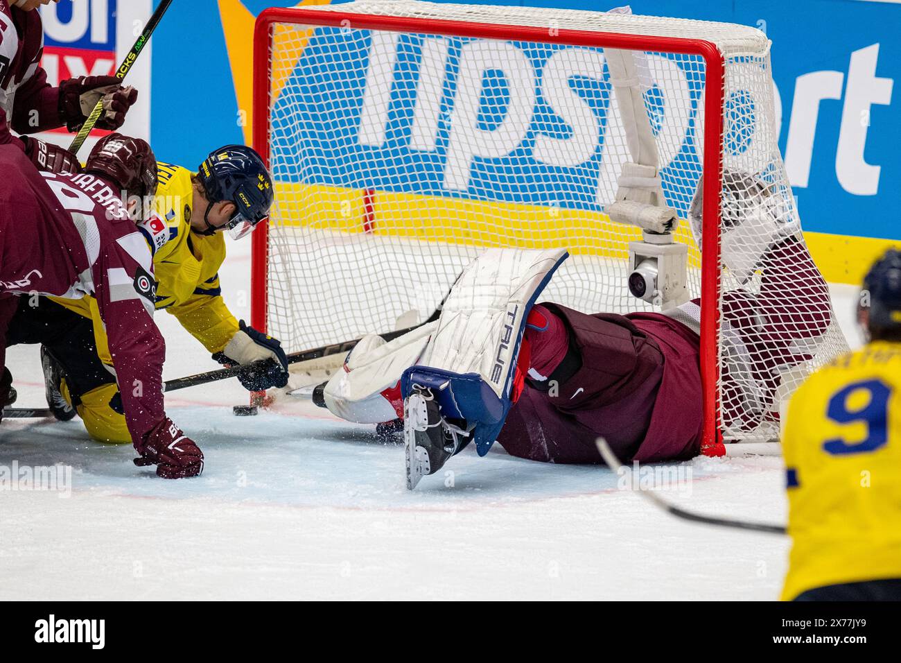 (L-R) Ralfs Freibergs of Latvia, Joel Eriksson Ek of Sweden, Latvia's ...